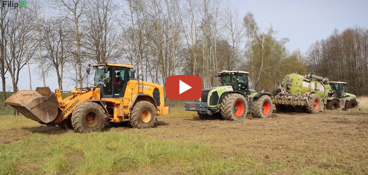 Claas Xerion 5000 heeft zich vastgereden bij het mest uitrijden ...